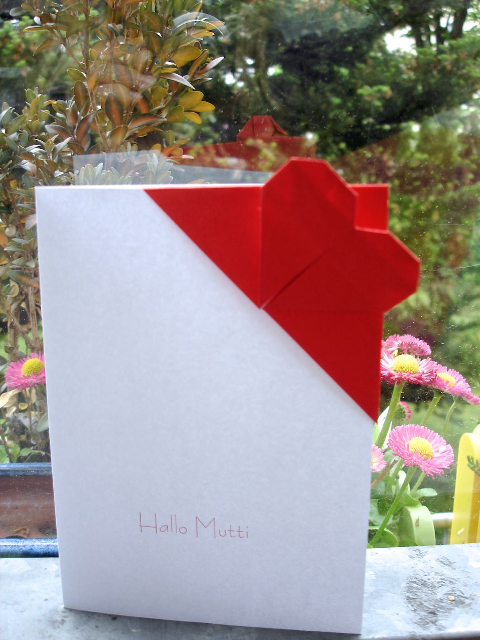 Herzorigami-Lesezeichen zum Muttertag – fadenspiel und fingerwerk